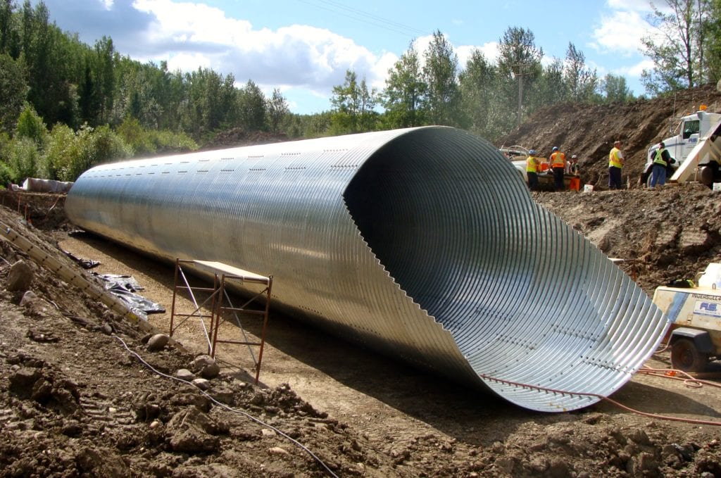 Wide-mouthed Bolt-A-Plate Pipe Arch culvert replacement makes a safer ...